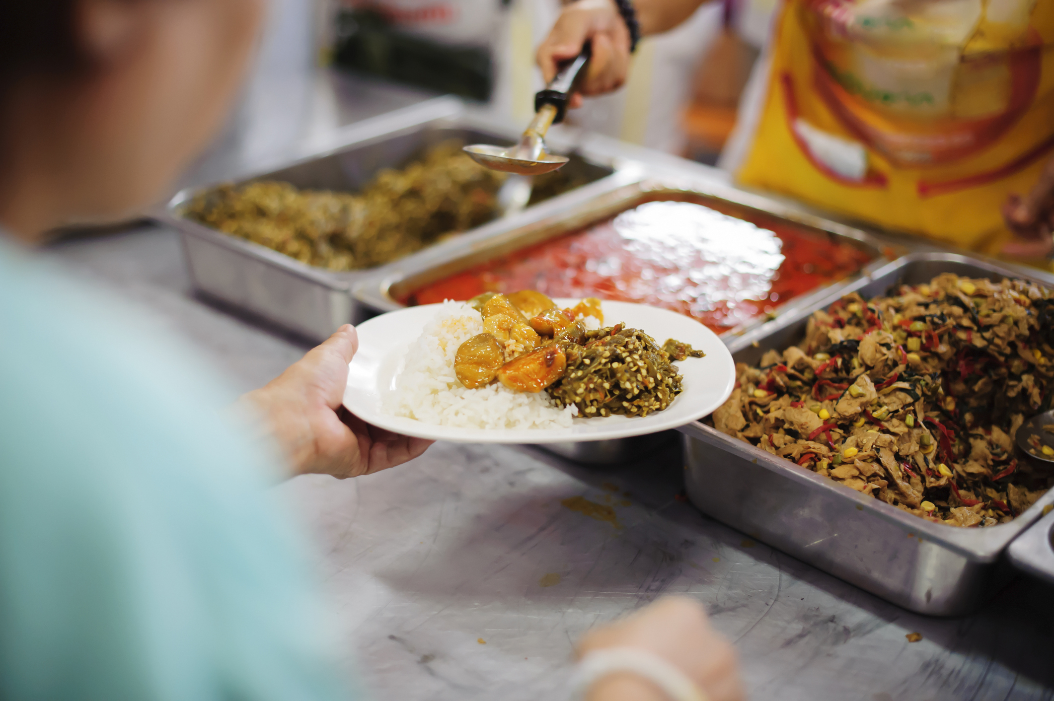 Volunteers Serving Food For Poor People Food Sharing Concept CMBG3 Law